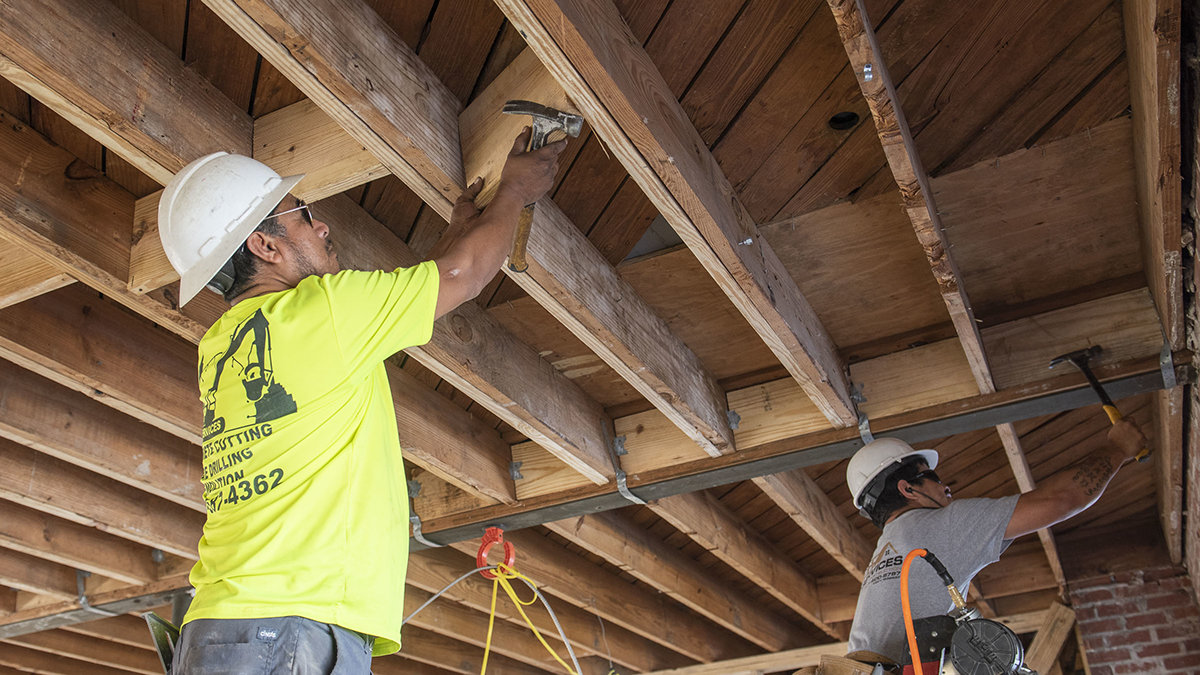 Rough Carpentry Crew Reinforces Interior Structure at Peoples Bank