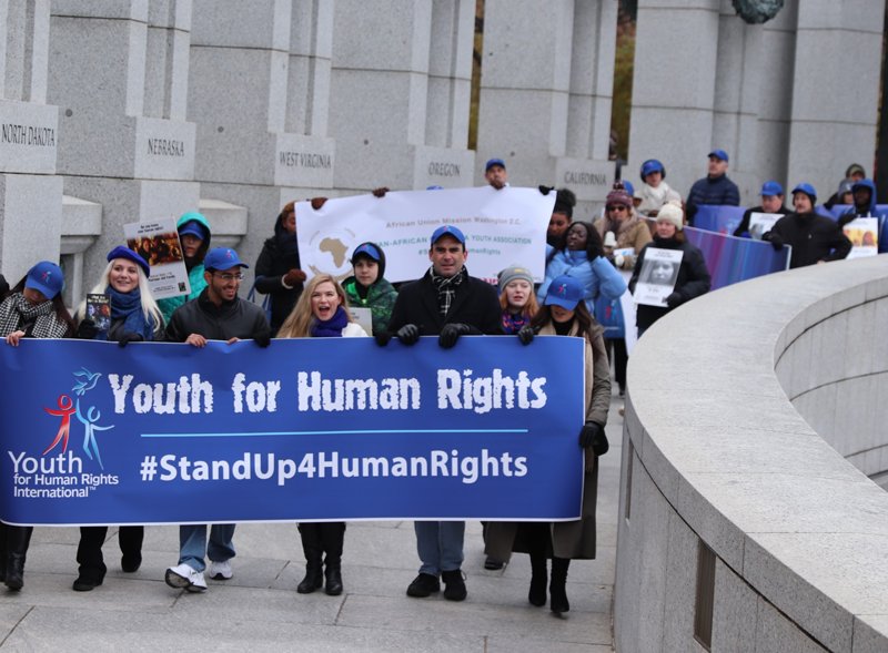 Activists March for Mandatory Human Rights Education